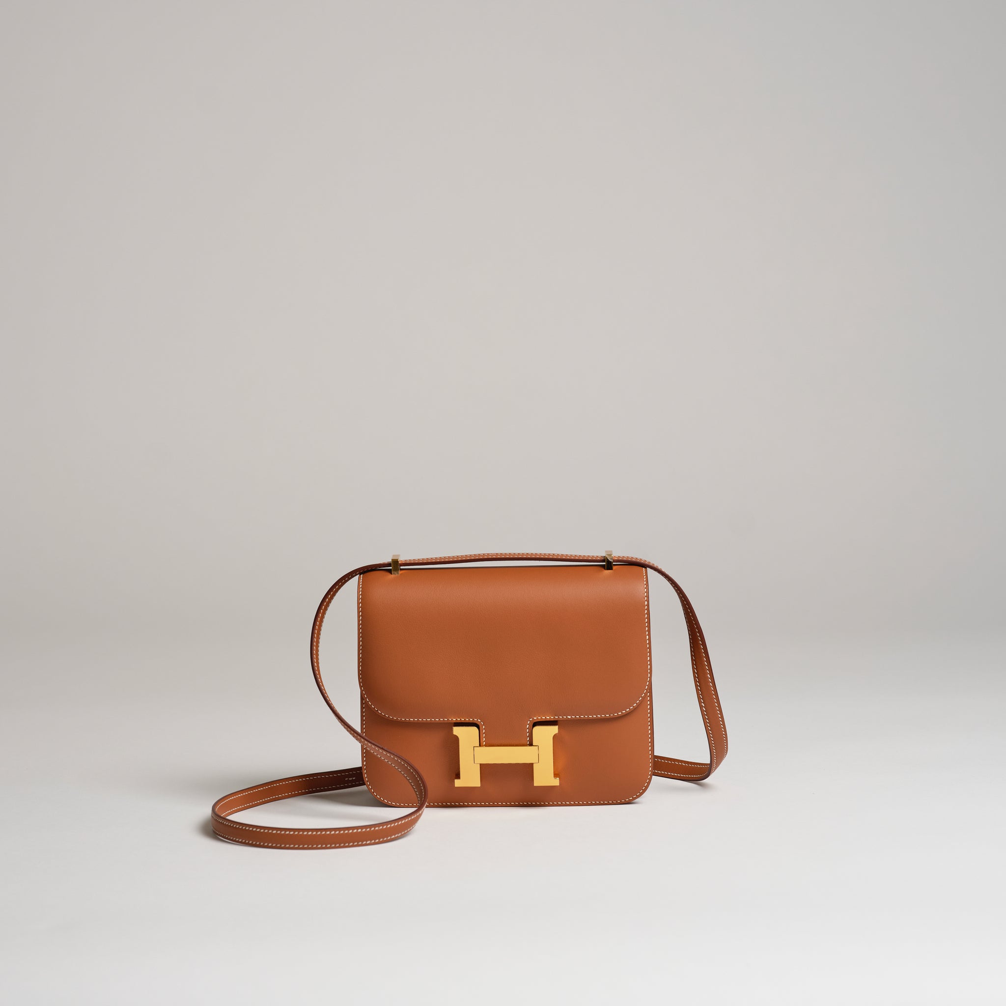 Hermès 18cm Mini Constance gold swift gold hardware