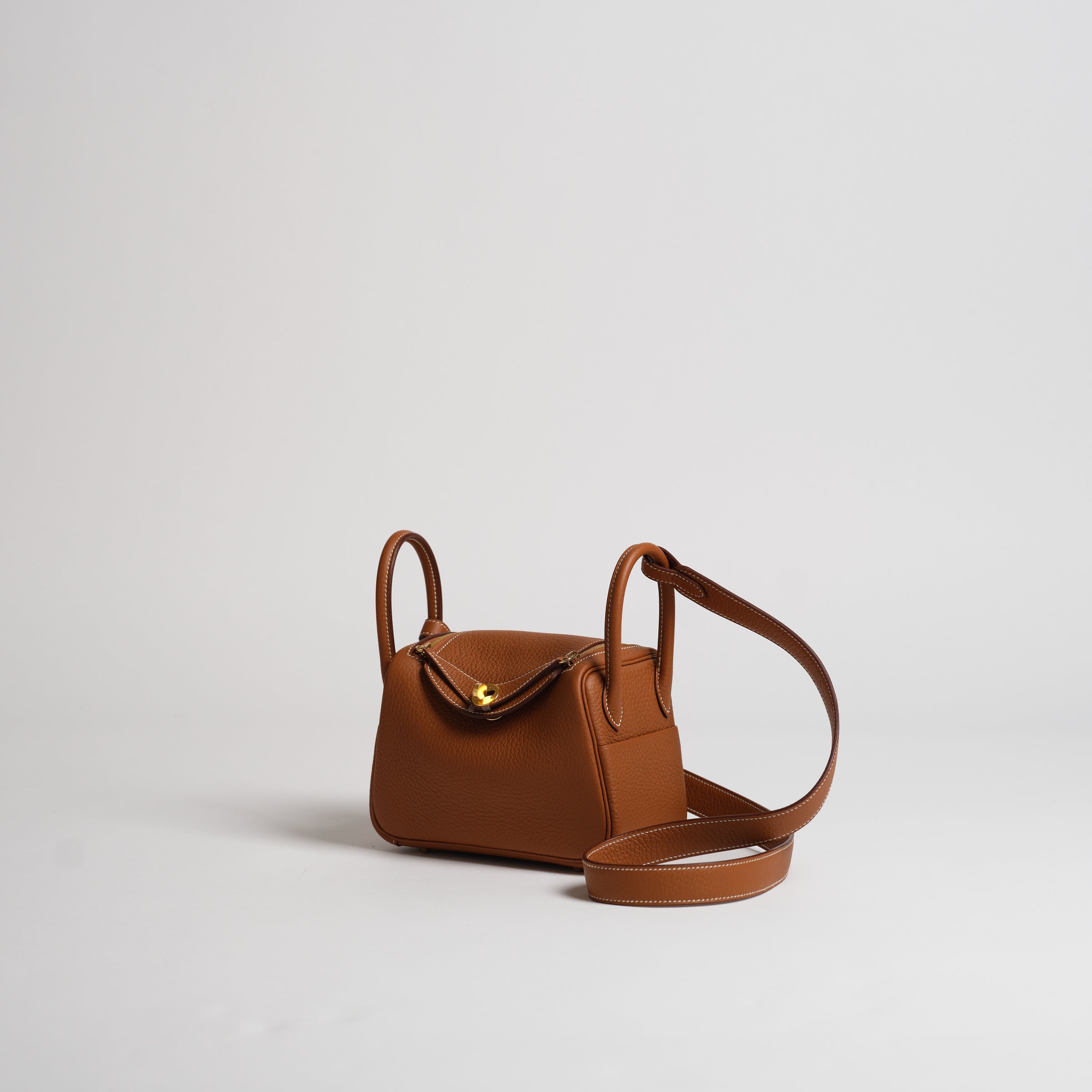 Hermès Mini Lindy gold clemence gold hardware